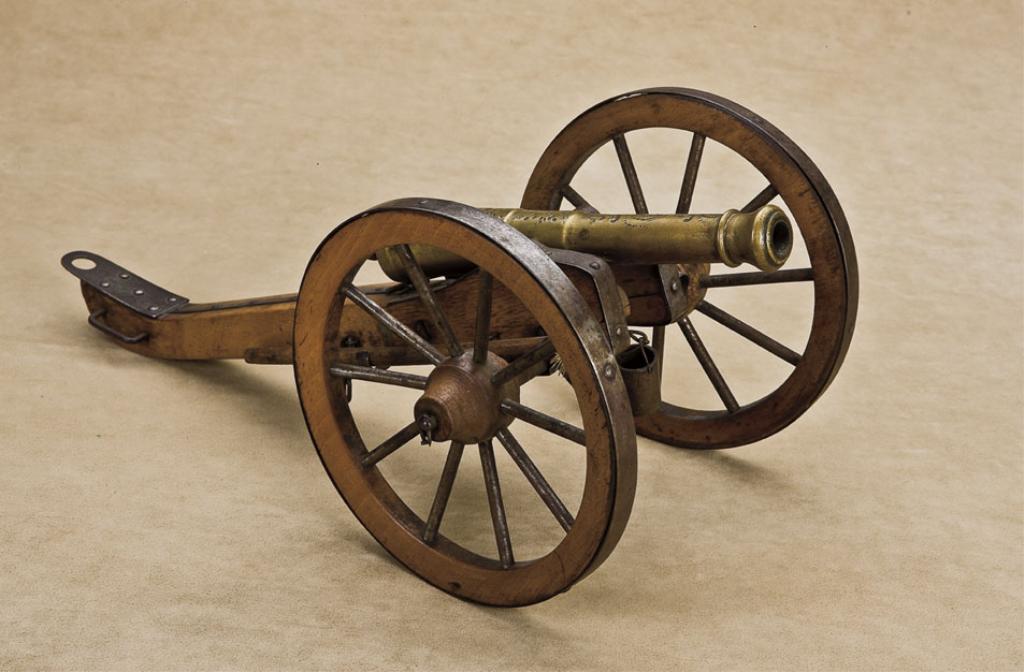 Antique miniature cannon with bronze tube, iron mounts, circa approx ...