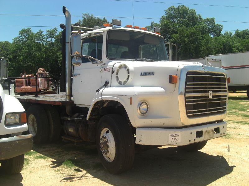 1990 FORD L9000 T/A FLATBED TRUCK