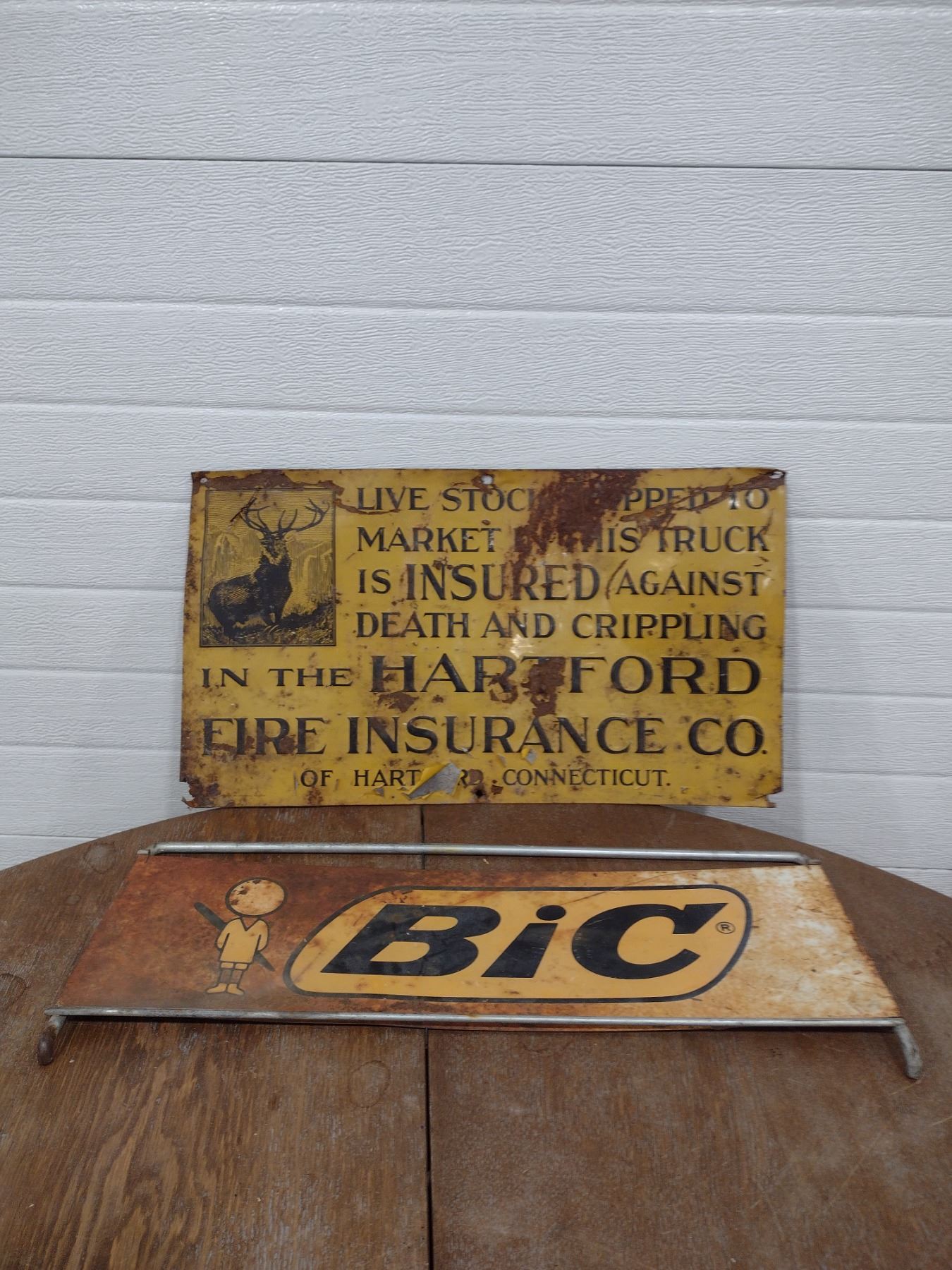 Bic advertising door push and insurance tin sign