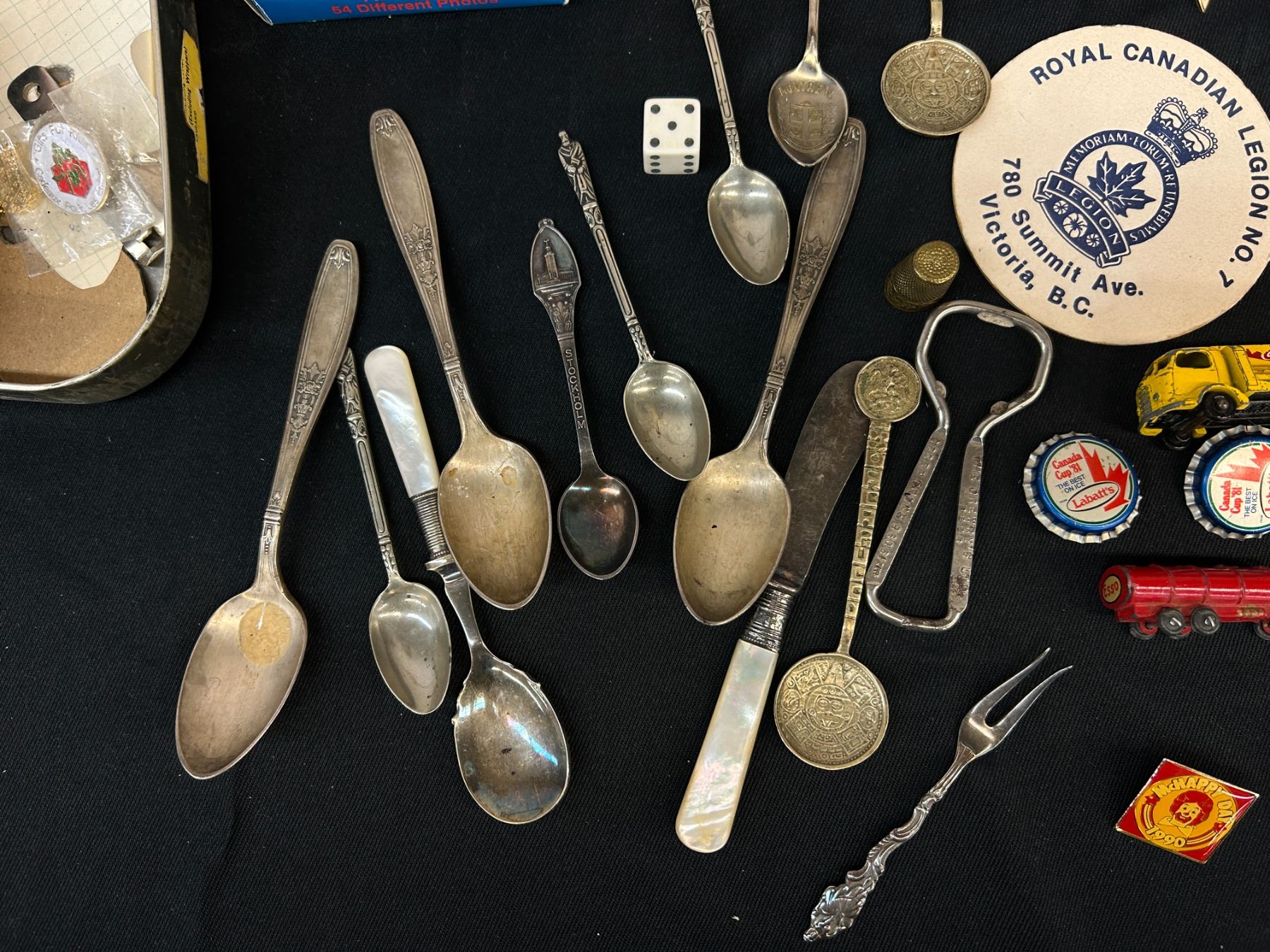 Junk Drawer of Collectible Souvenir Travel Spoons, Pins, Toy Cars, Etc