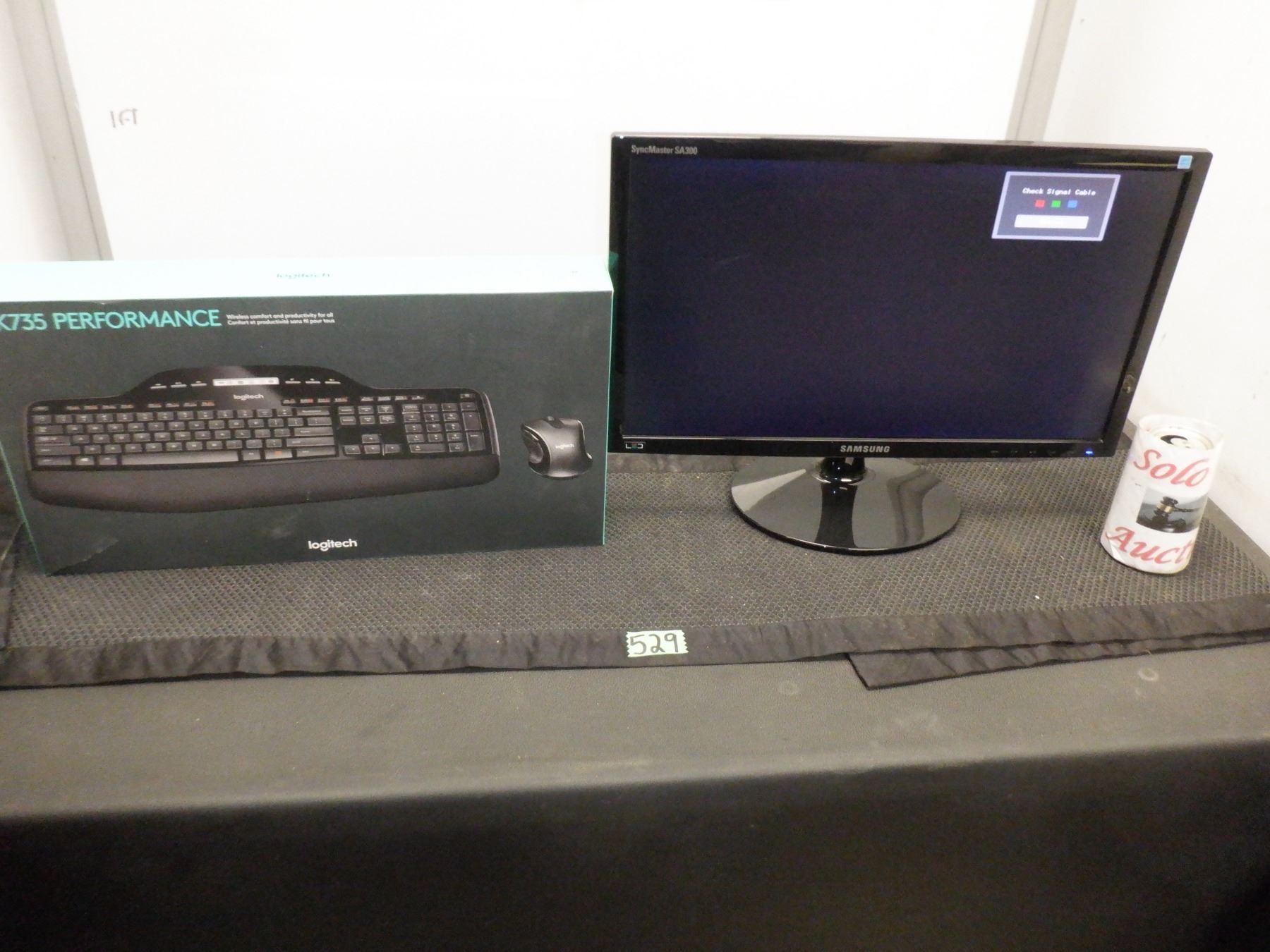Samsung computer monitor and Logitech cordless mouse and keyboard set