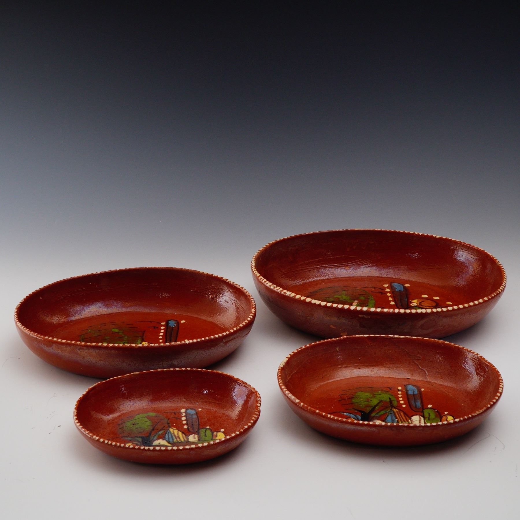 Set of 4 Mexican Redware Pottery Hand Painted Dishes