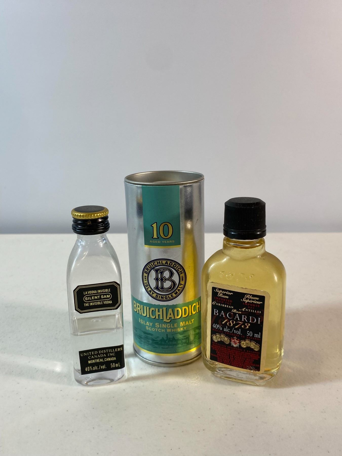 Miniature liquor bottles - 3 bottles (Silent Sam, Bruichladdich 10 ...