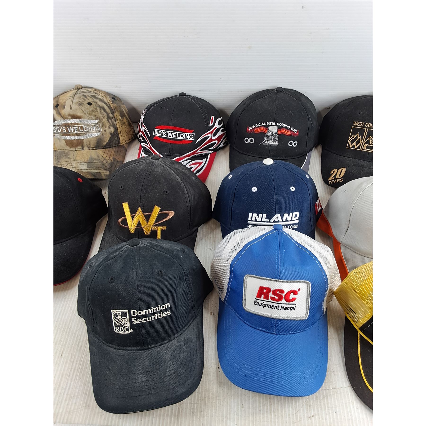 (13) Caps- West Country Photo, Sid's Welding, RBC Dominion Securities ...