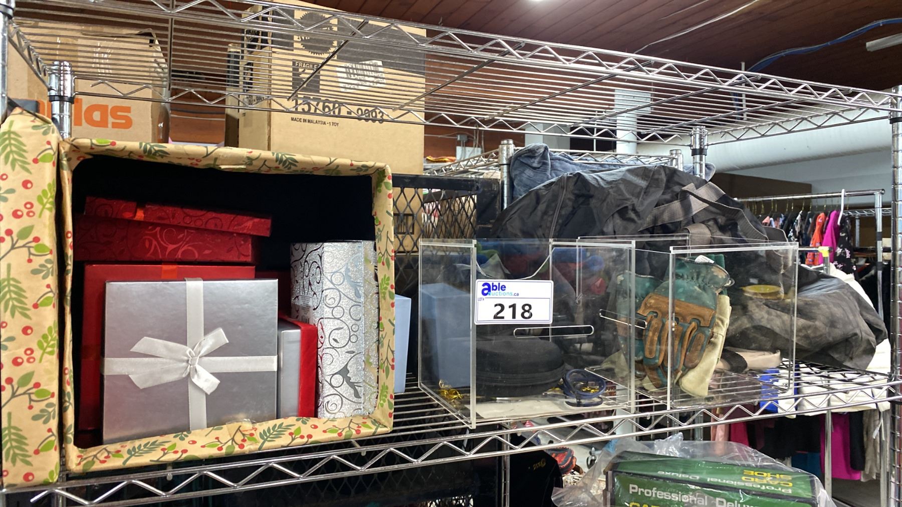 SHELF OF GIFT BOXES, GLOVES, CLEAR BOXES & MORE - Able Auctions