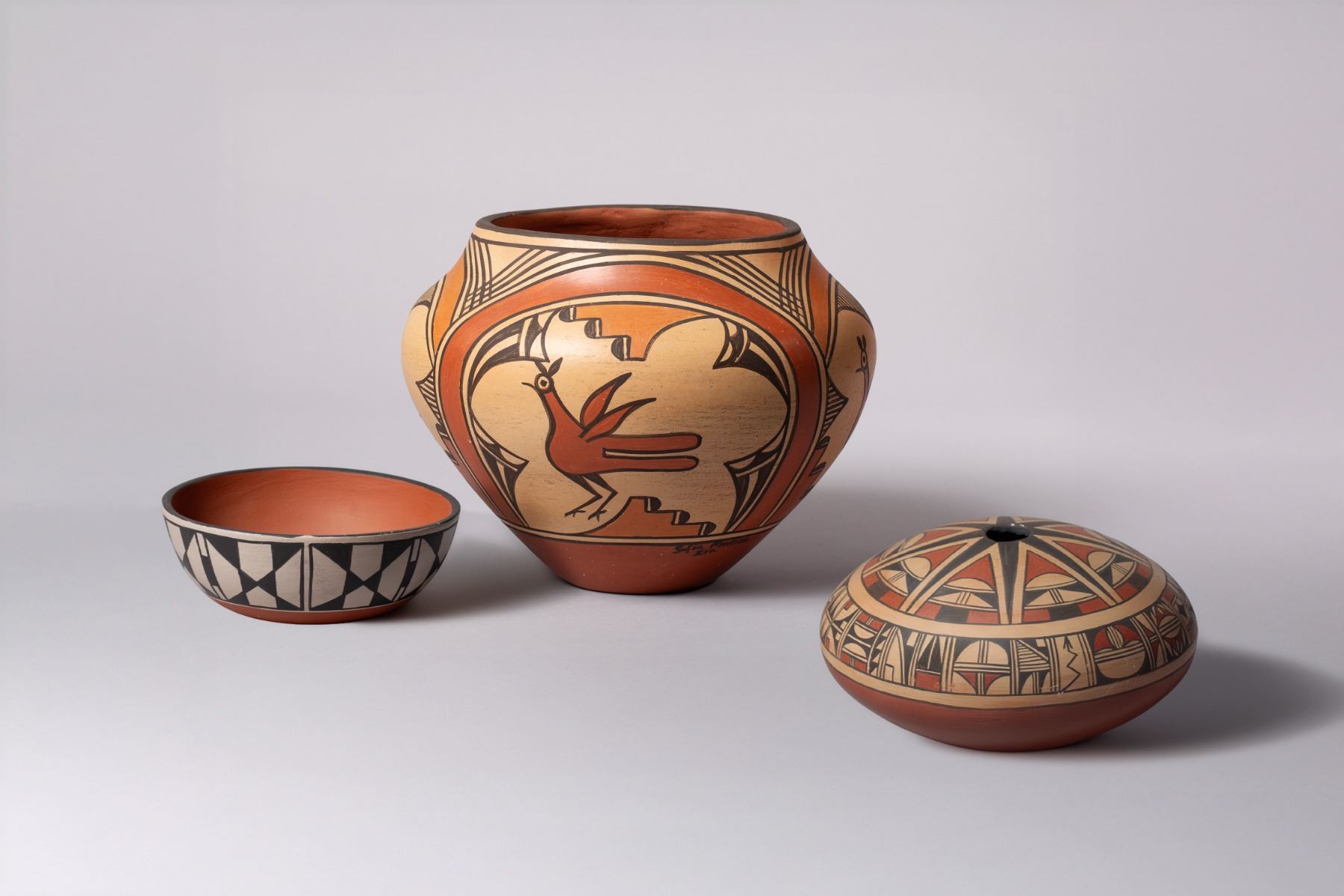Three Interesting Pueblo Pots including a Zuni Decorated Seed Pot, a ...