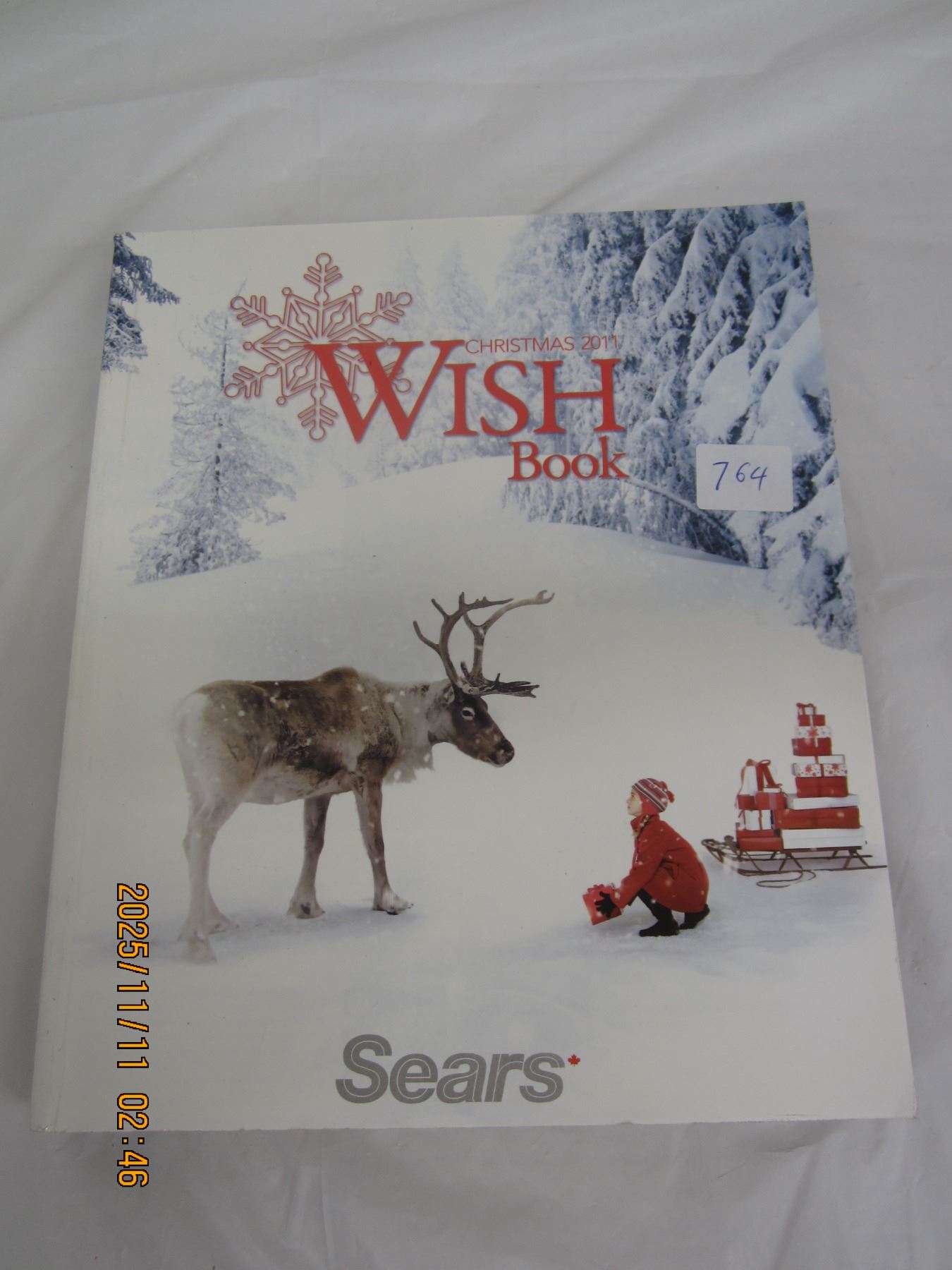 764. 2011 Sears Christmas Wish Book Catalogue - Schmalz Auctions