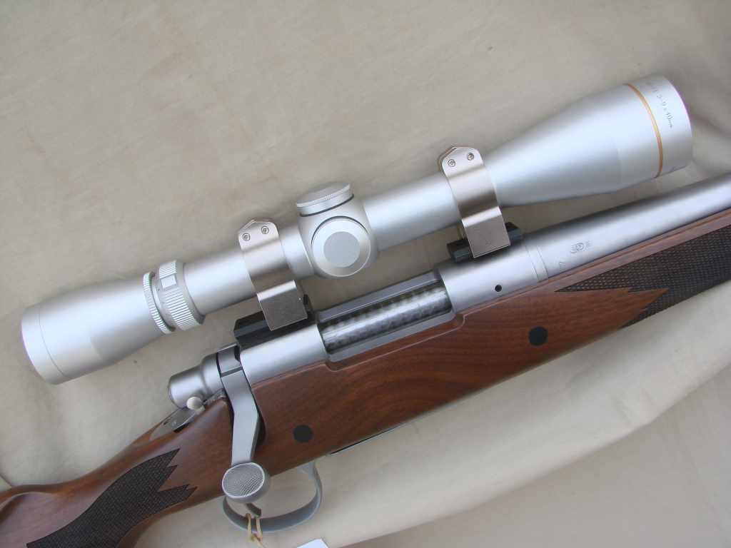 REMINGTON 700 IN 300 WSM STAINLESS FLUTED BARREL WITH LEUPOLD VARI X 2 3X9 SCOPE LOOKS TO BE AS remington-700-in-300-wsm-stainless-fluted-barrel-with-leupold-vari-x-2-3x9-scope-looks-to-be-as