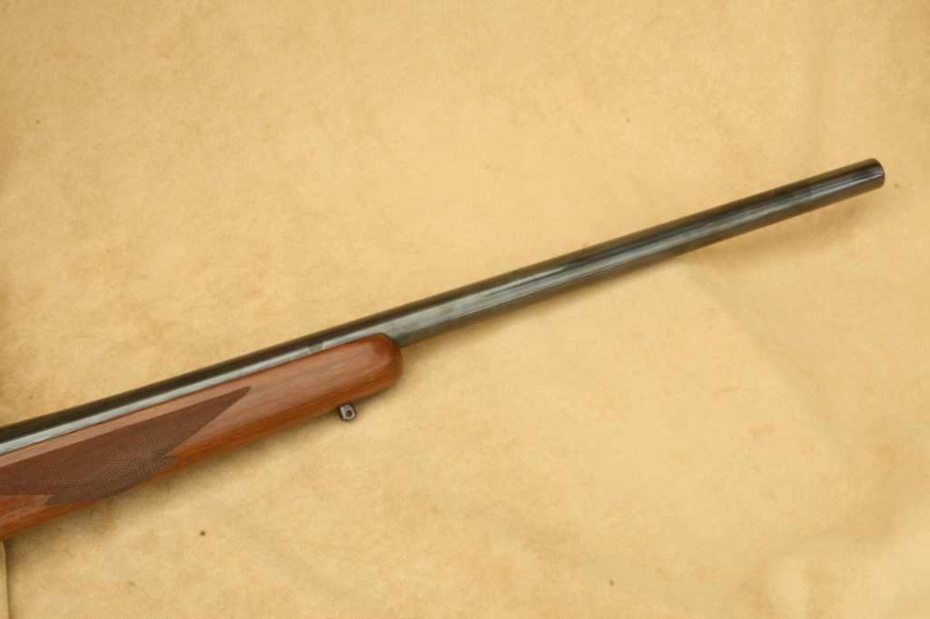 RUGER M77, FACTORY HEAVY BARREL IN 308 CAL, WITH RINGS, SHOWS A FEW ...