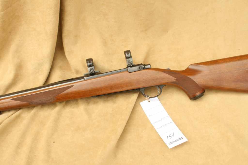 RUGER M77, FACTORY HEAVY BARREL IN 308 CAL, WITH RINGS, SHOWS A FEW ...