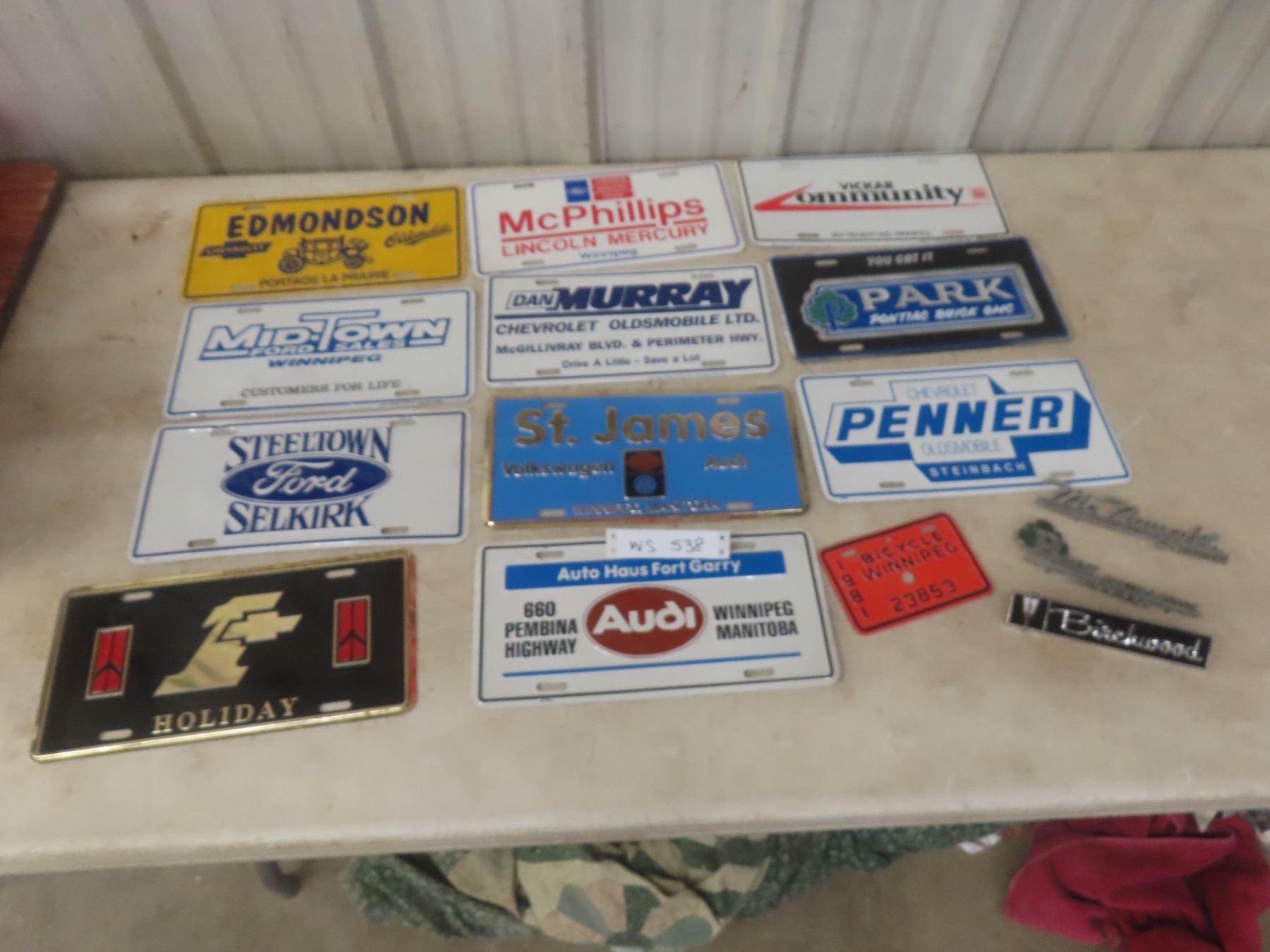 Assorted License Plates and Chrome Auto Emblems - McSherry Auction ...