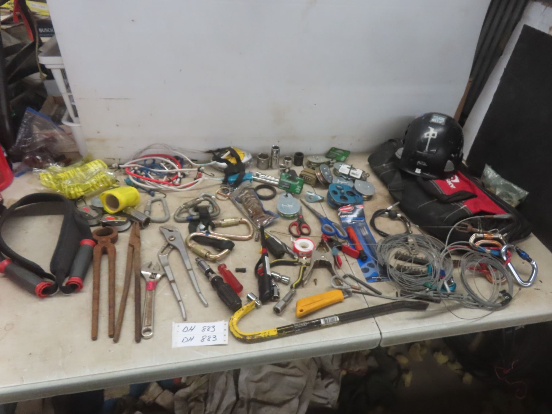 Husky Tool Bag Filled With Pulleys, Bungee Cords, Allen Keys, Wire, And ...