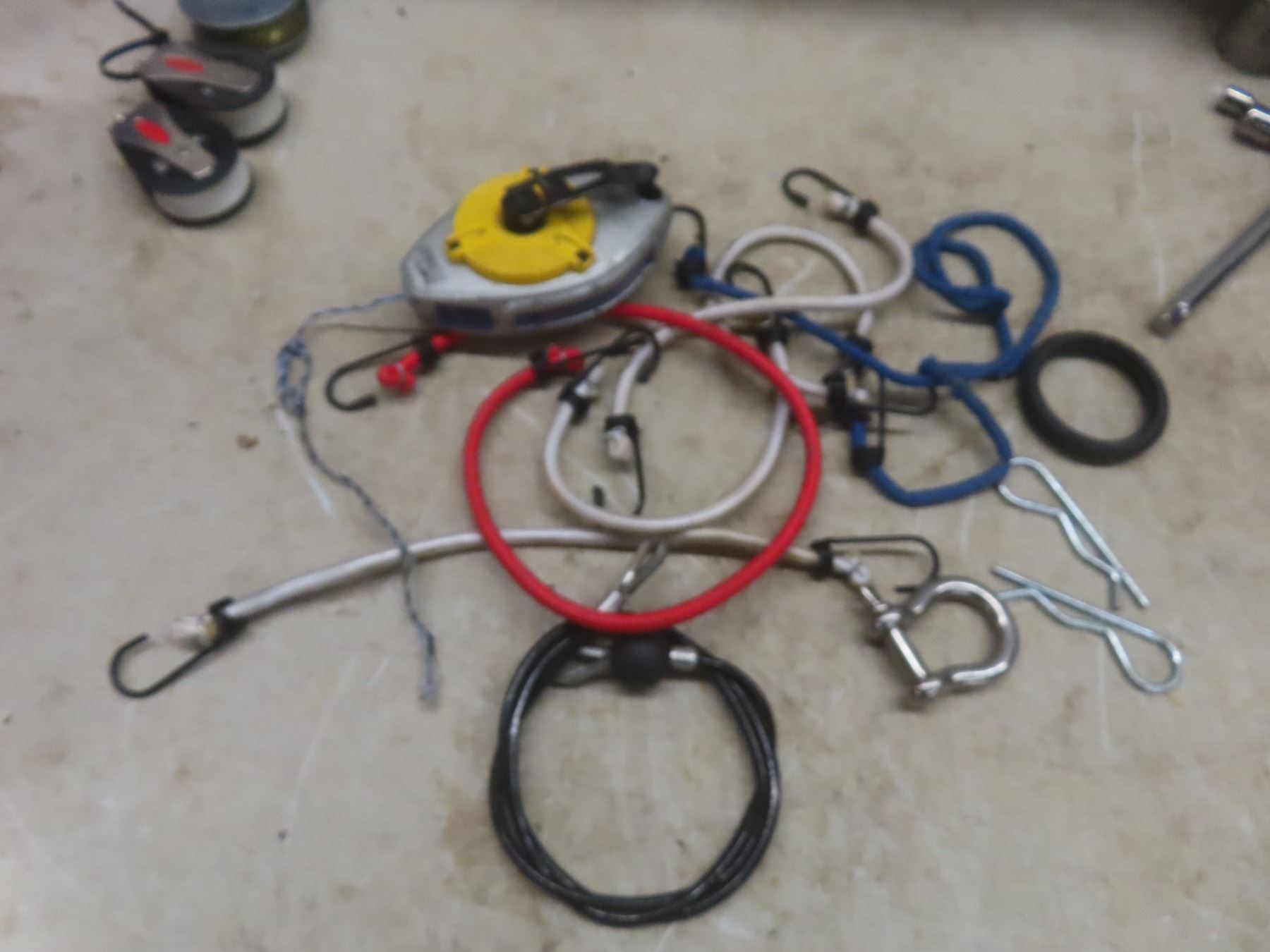 Husky Tool Bag Filled With Pulleys, Bungee Cords, Allen Keys, Wire, And ...