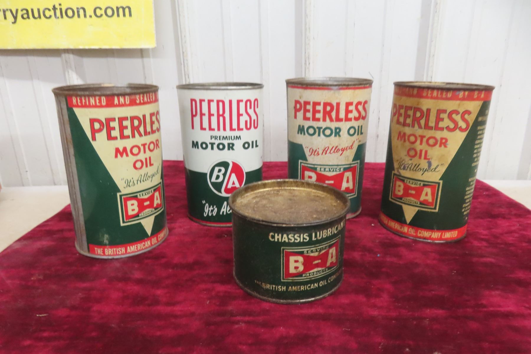 5 BA Cans: (1) 1lbs Grease Can, (4) Motor Oil Quart