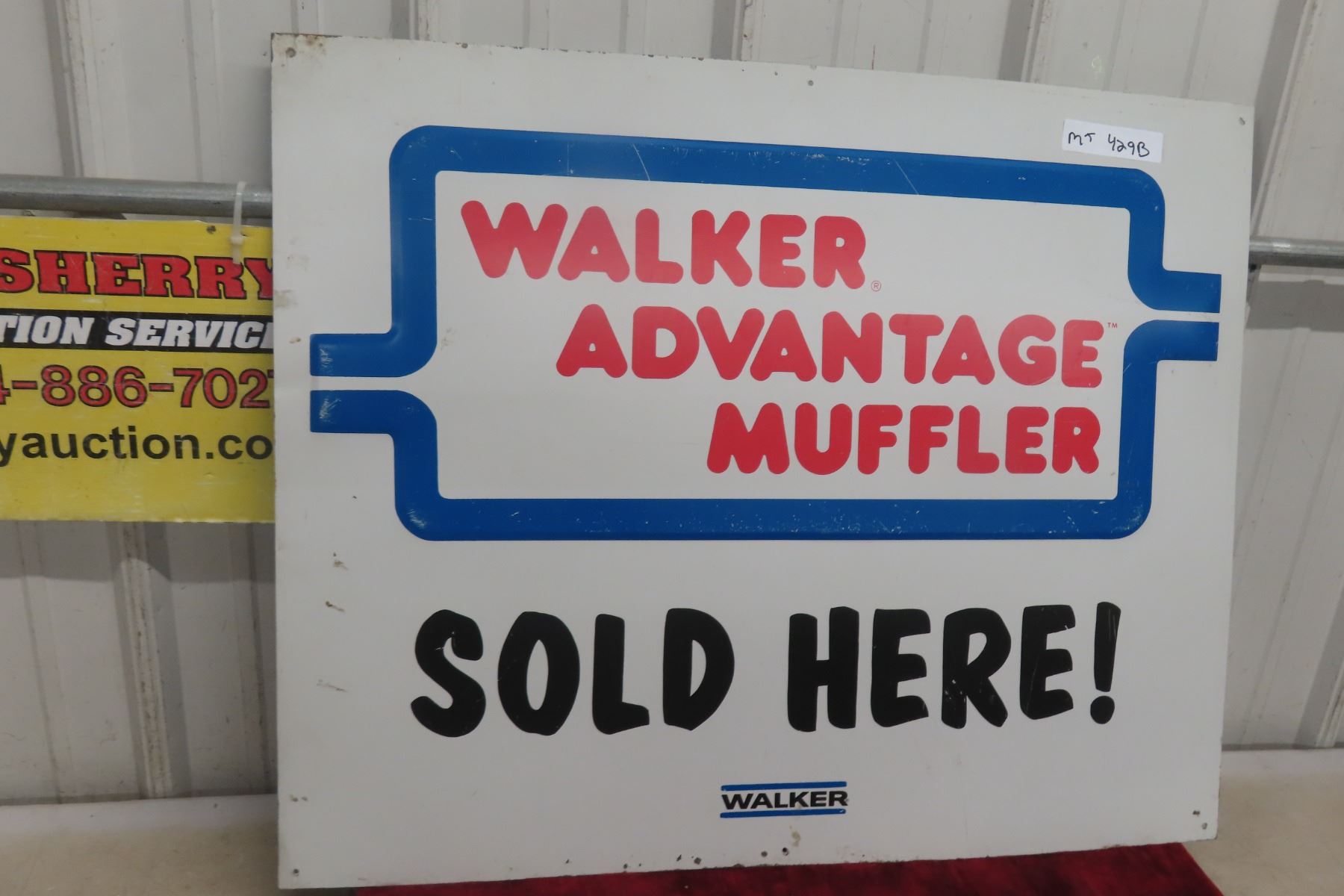 Vintage Walker Muffler "Sold Here" Metal Embossed Sign, Measuring 24" x 30"