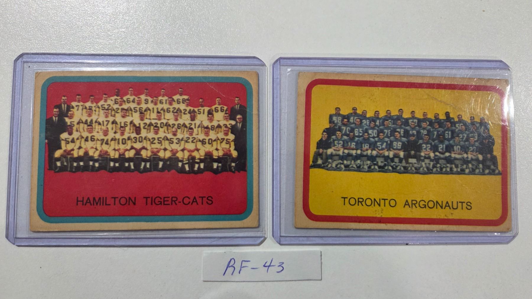 1963 Topps CFL Cards, #39 Hamilton Team Picture, #77 Toronto Team Picture