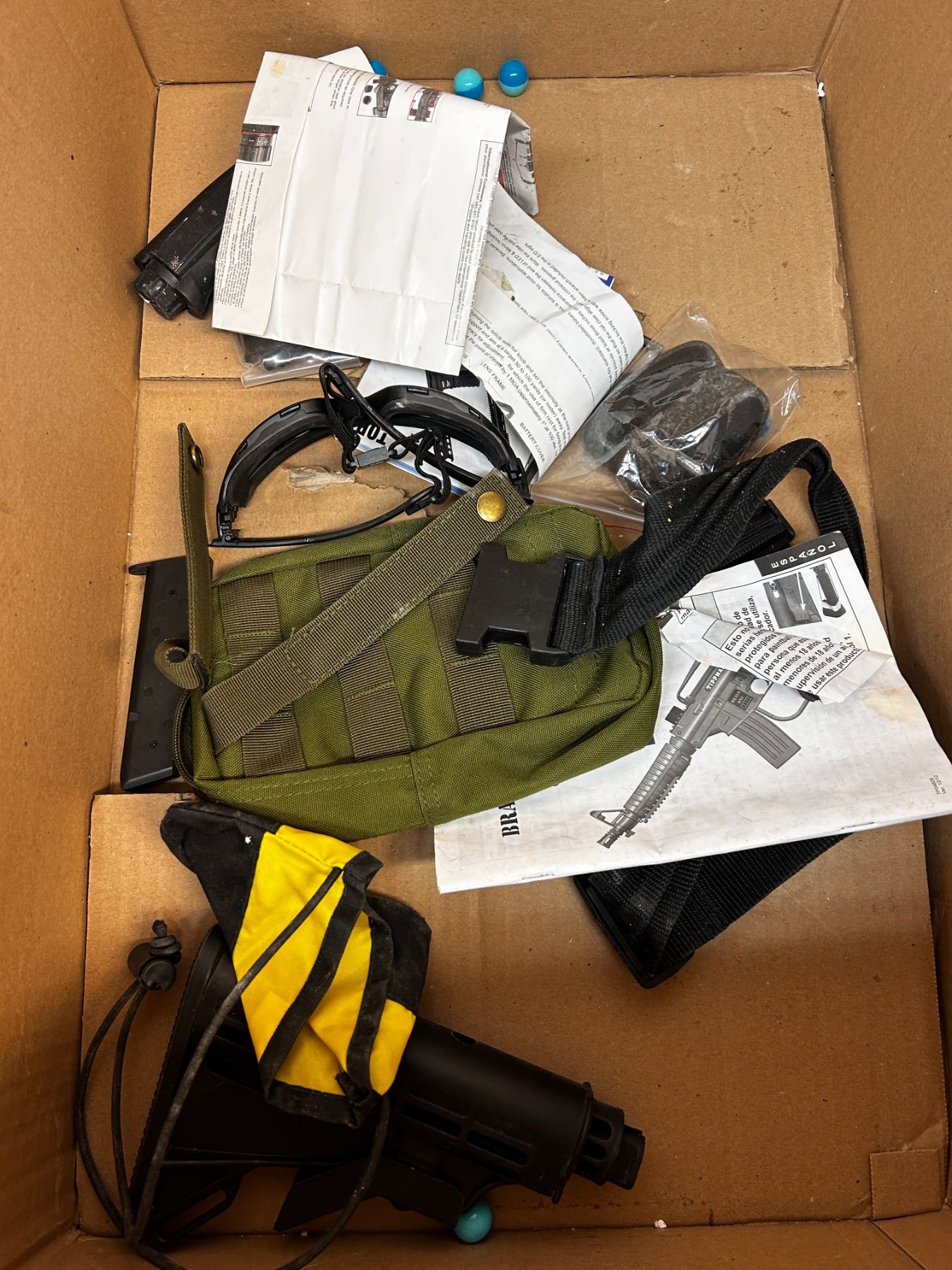 Box of Paintball Guns, Paint Balls and Accessories