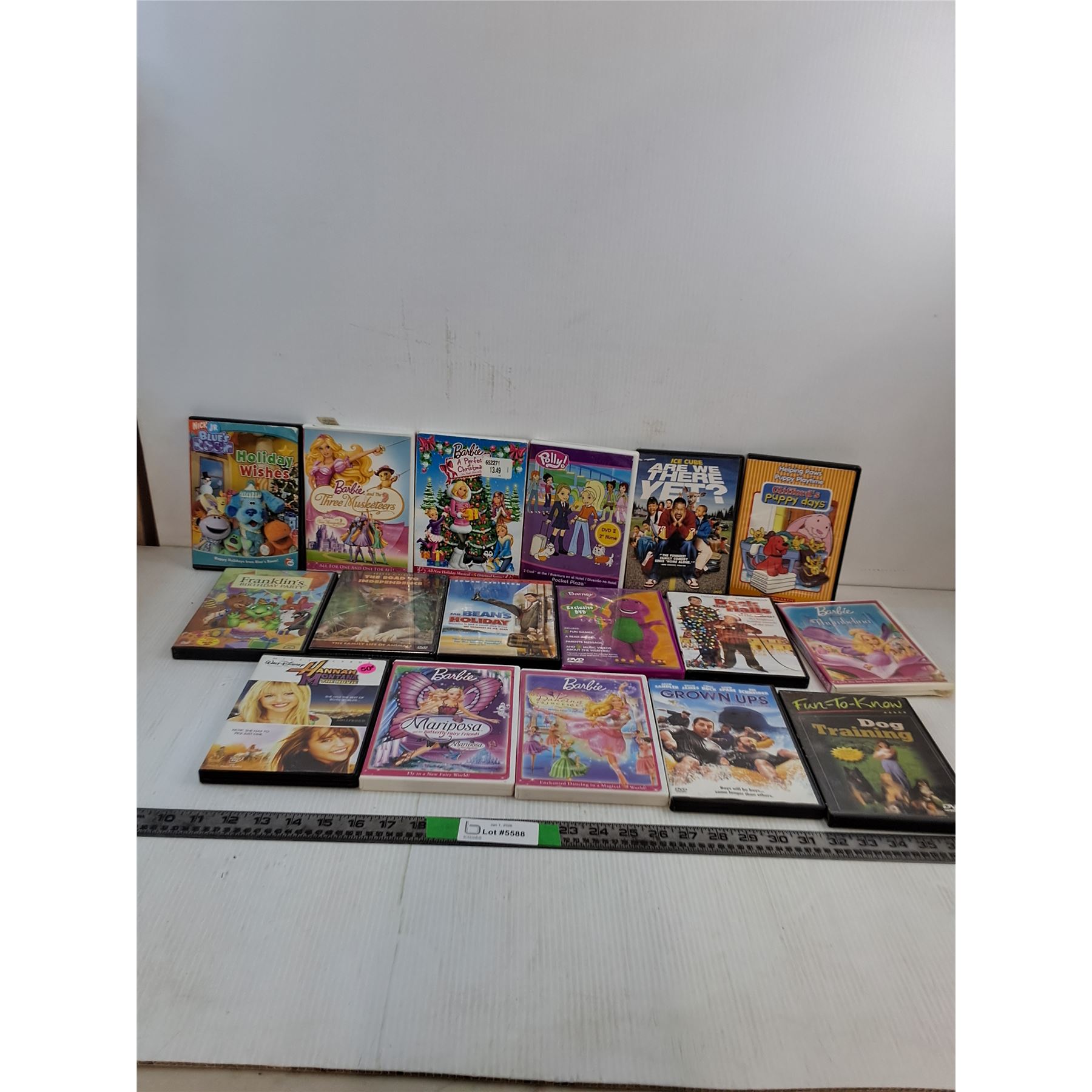 (17) DVDs: Blues Clues, Barbie, Polly, Are We There Yet, Clifford ...
