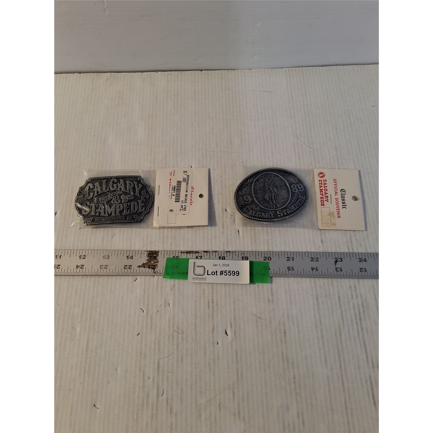 (2) Belt Buckles, 1988 & 1989 Calgary Stampede - Bodnarus Auctioneering