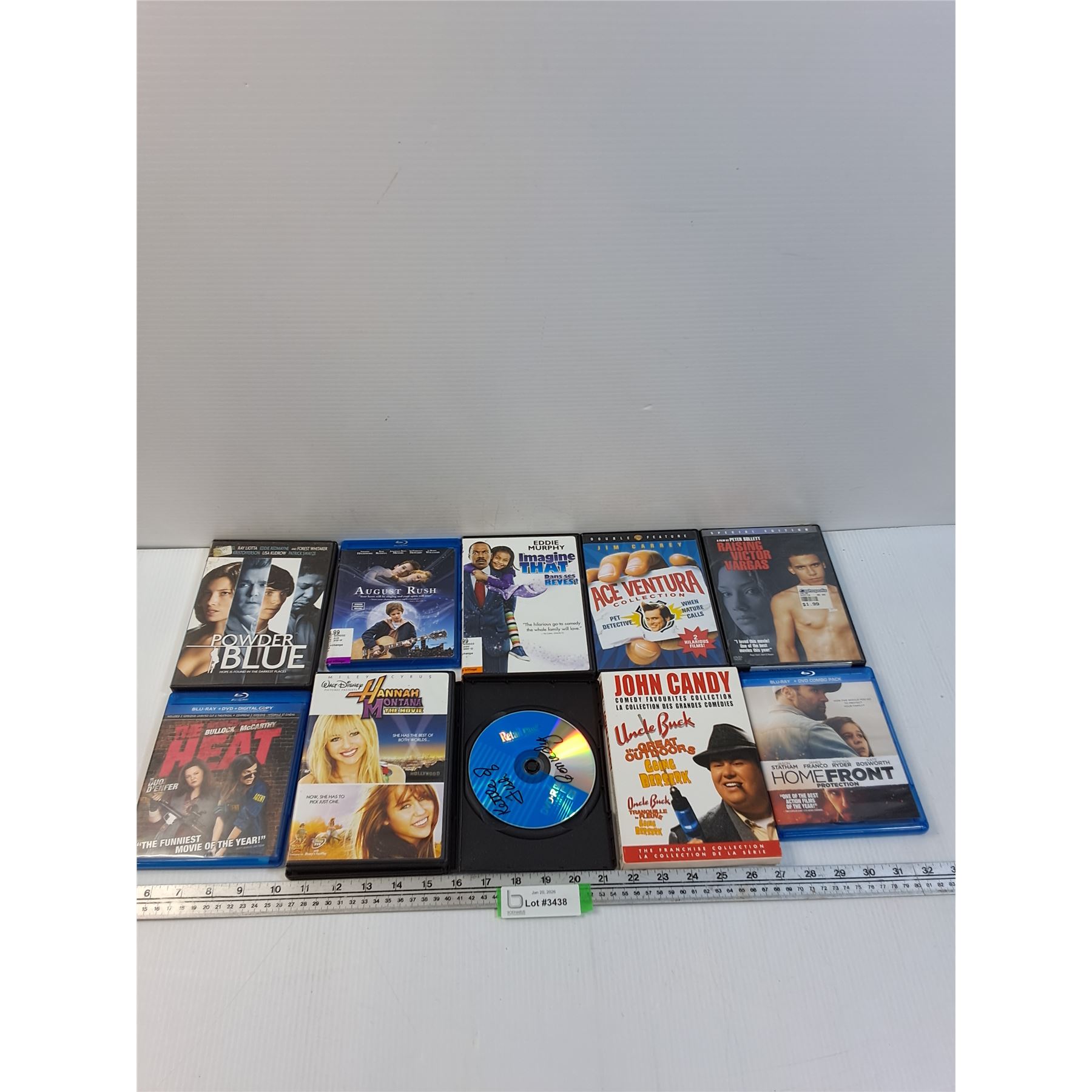 (10) DVDS: The Heat, John Candy "Uncle Buck", Ace Ventura, Misc - Bodnarus Auctioneering