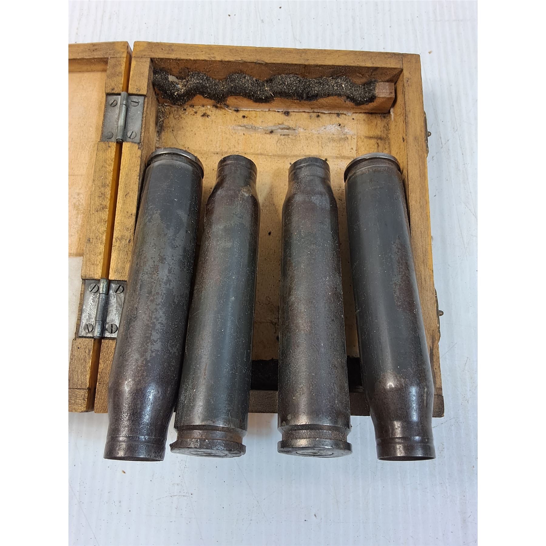 (4) Artillery Shells in Case - Empty - Bodnarus Auctioneering