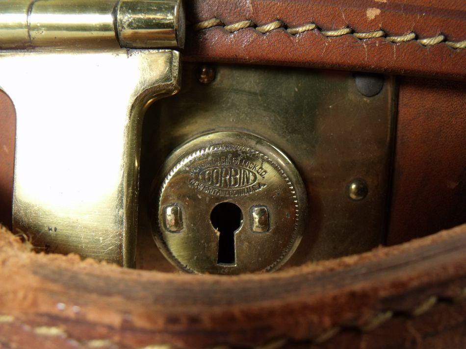 A Vintage Leather and Brass Hat Box.