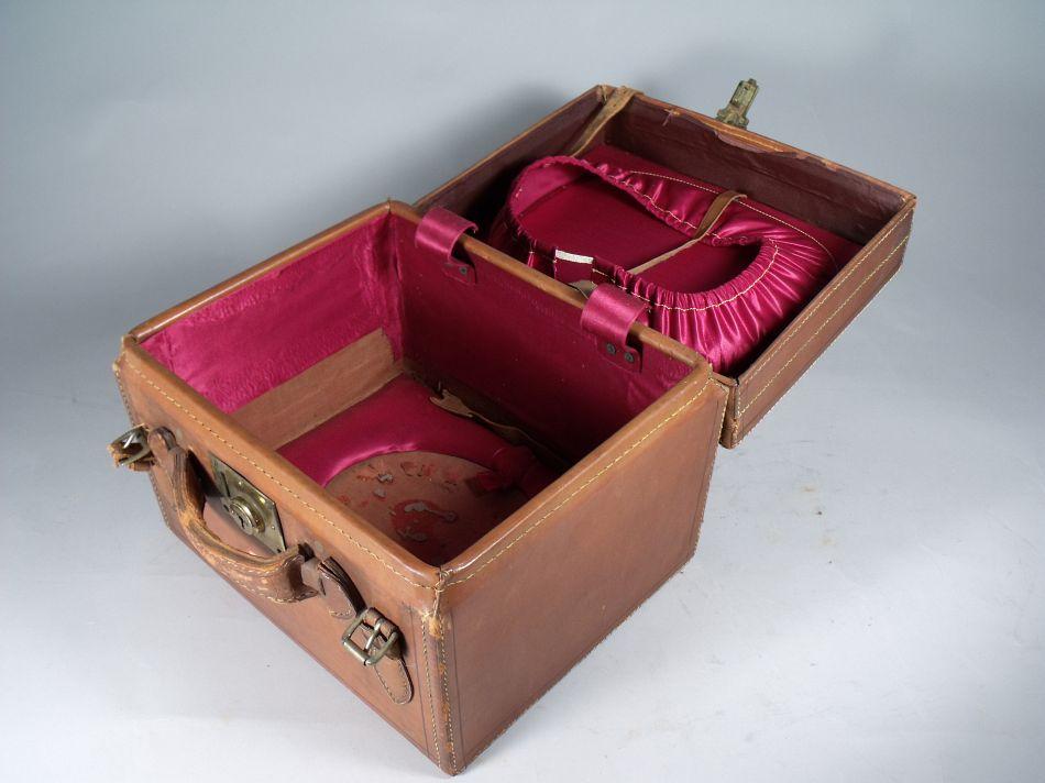A Vintage Leather and Brass Hat Box.