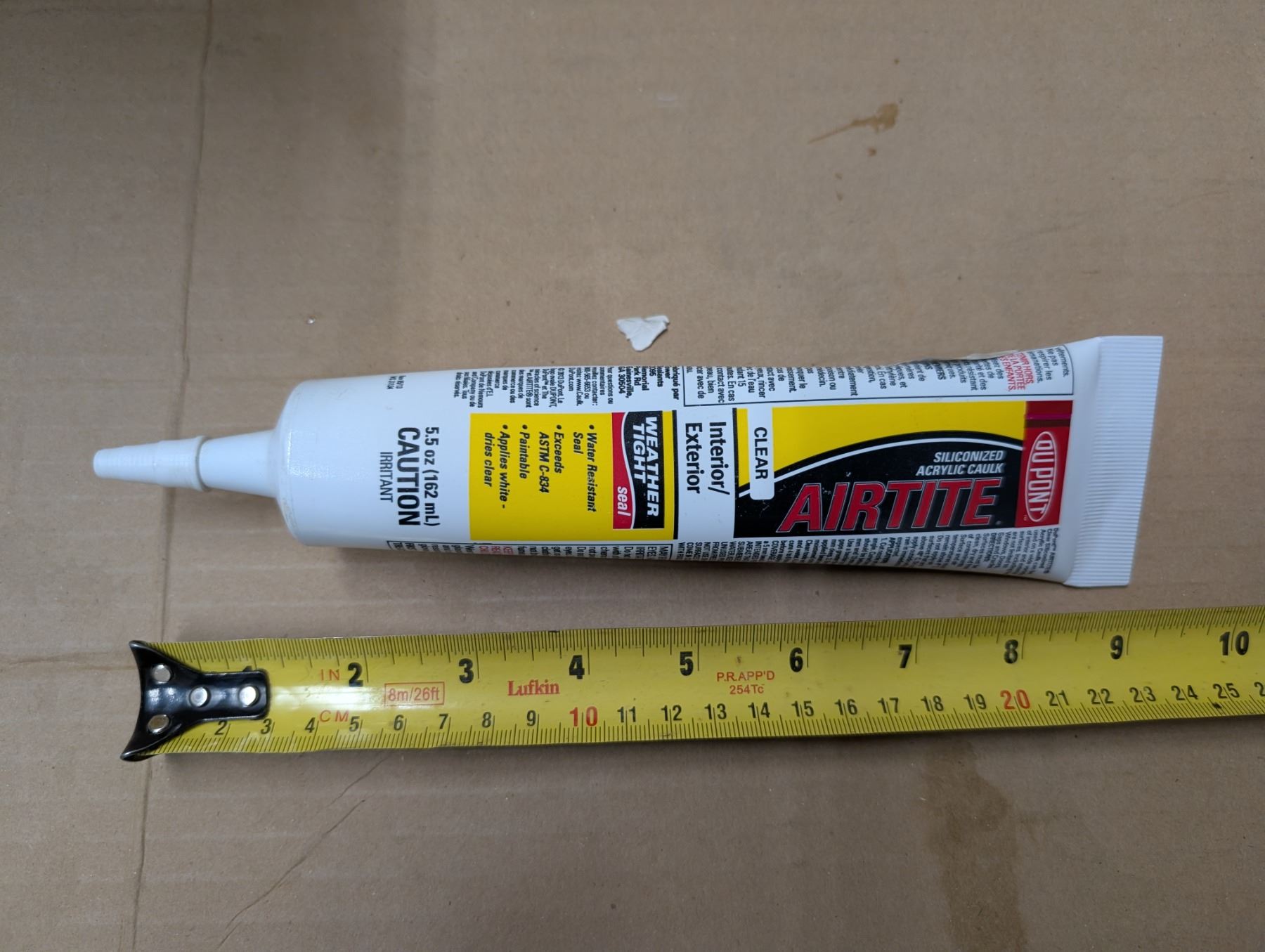 Box of DUPOINT Siliconized Acrylic Caulk Airtite, Clear, and water ...