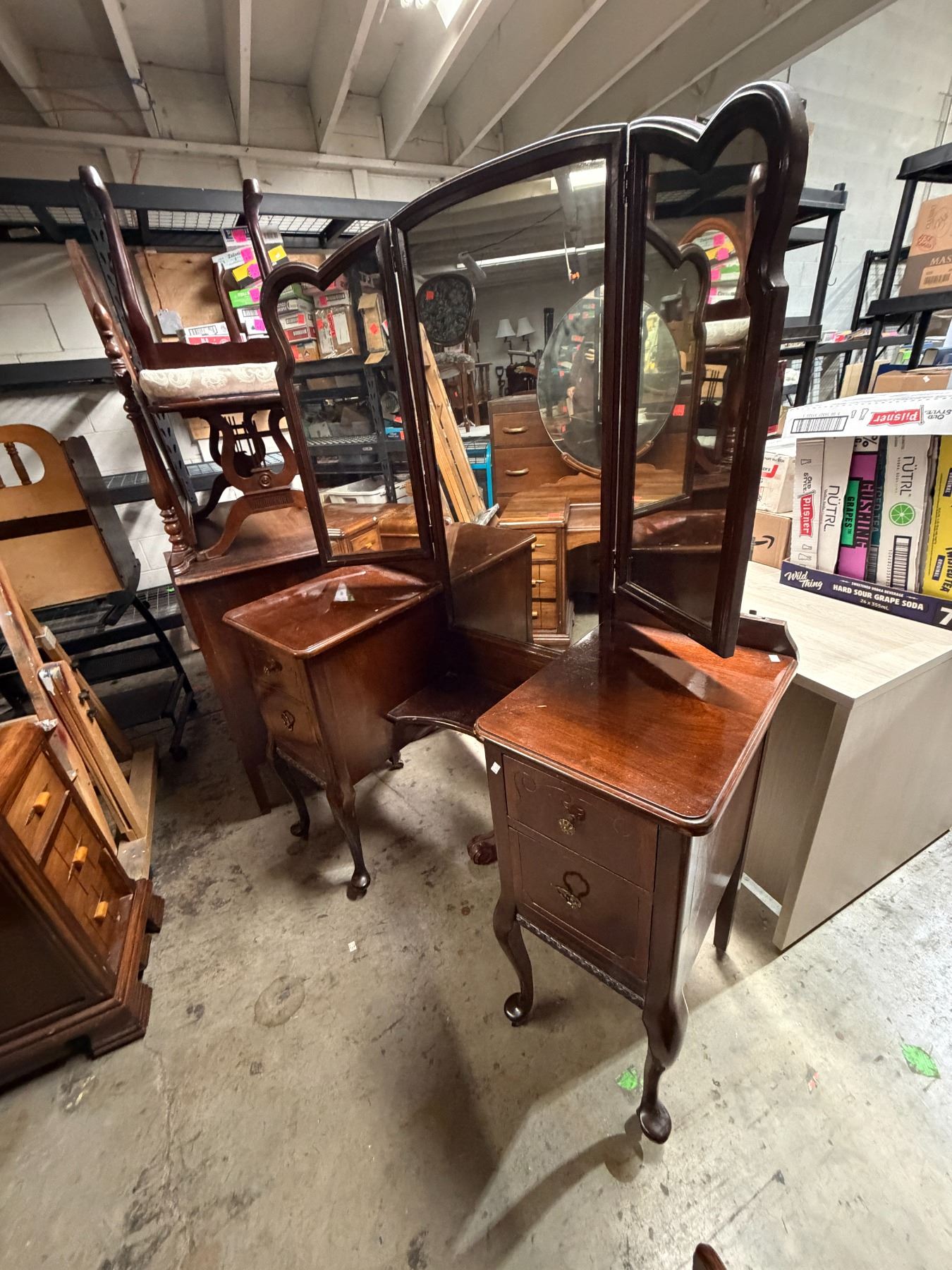 antique Queen Anne style mahogany drop-center vanity featuring a tri ...