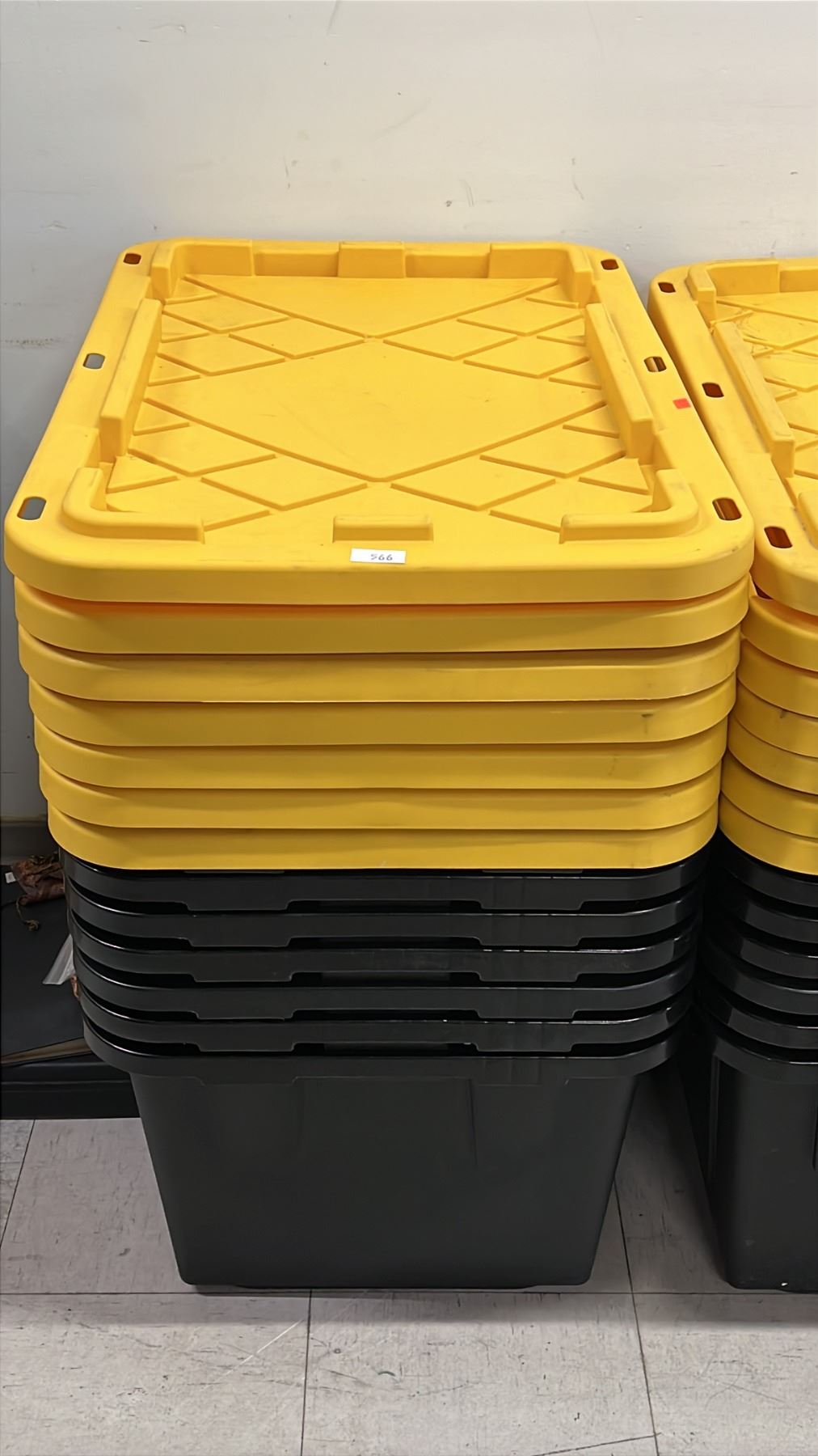 STACK OF (7) LARGE BLACK TOTES WITH YELLOW LIDS - Able Auctions