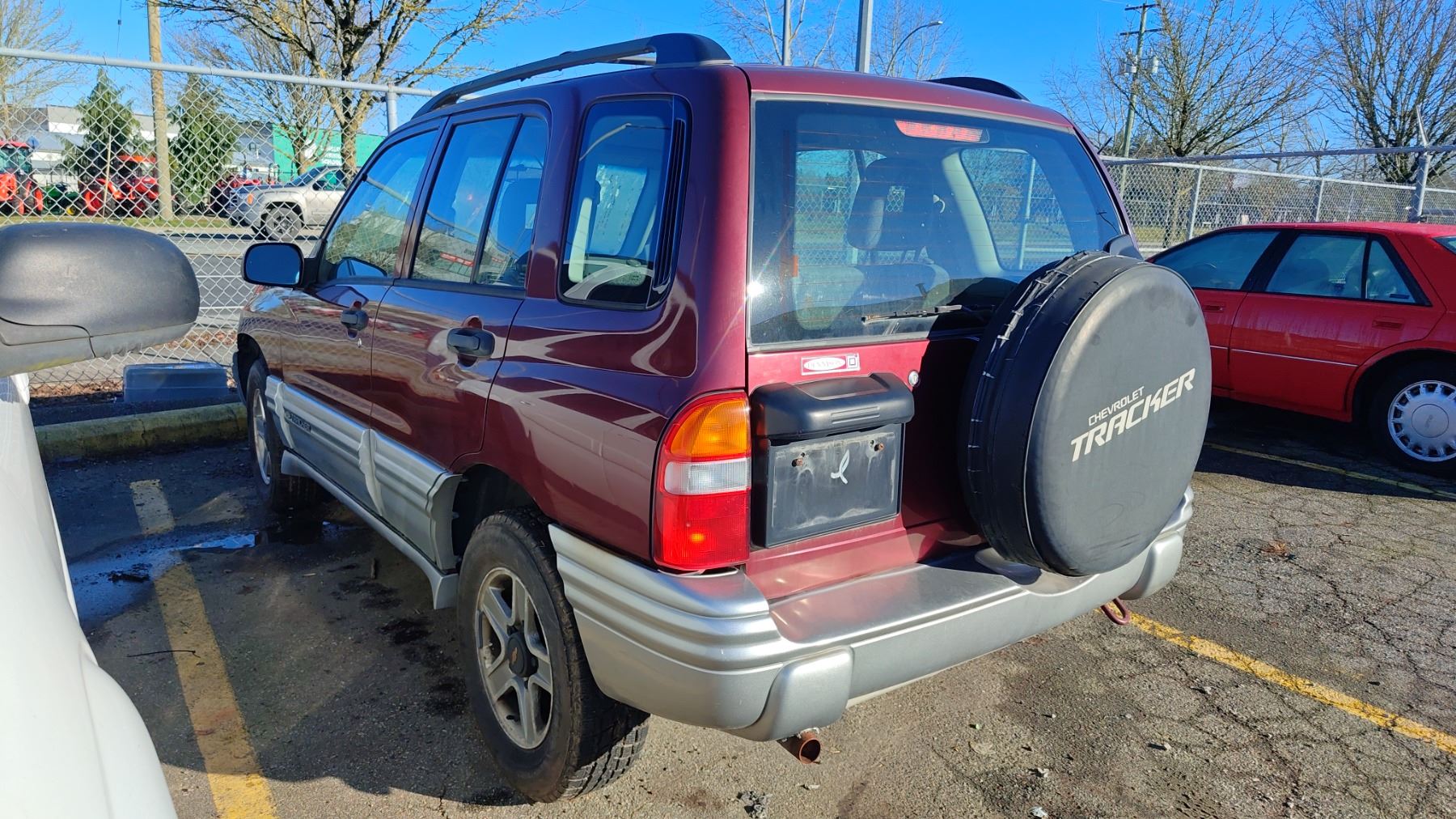 2002 CHEVROLET TRACKER, 4DRSW, RED, VIN 2CNBJ13C326930496, - Able Auctions