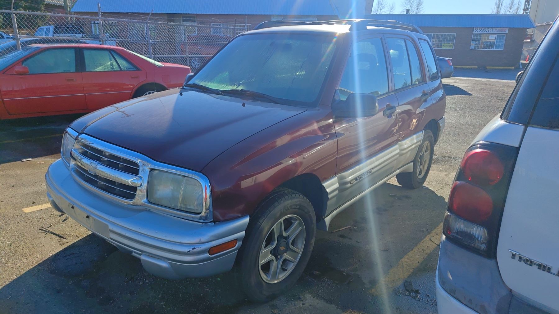 2002 CHEVROLET TRACKER, 4DRSW, RED, VIN 2CNBJ13C326930496, - Able Auctions
