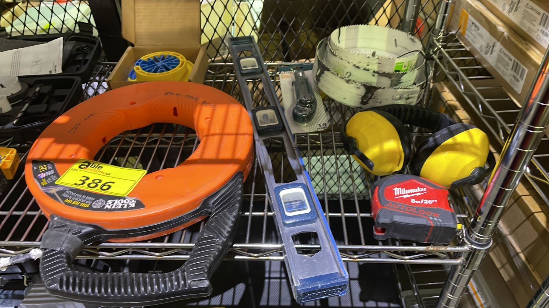 SHELF OF ASSORTED TOOLS INCLUDING; KLEIN STEEL FISH TAPE 120 FT, DRILL ...