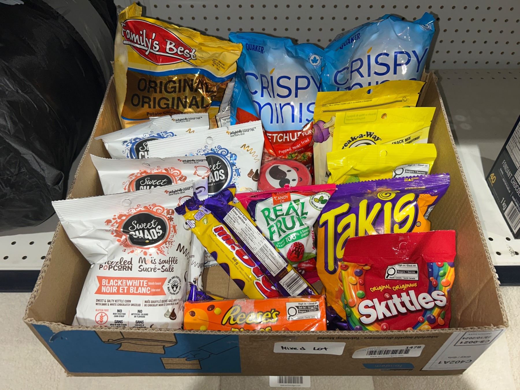 Snack Items Including Chips, Sweets, and Candy