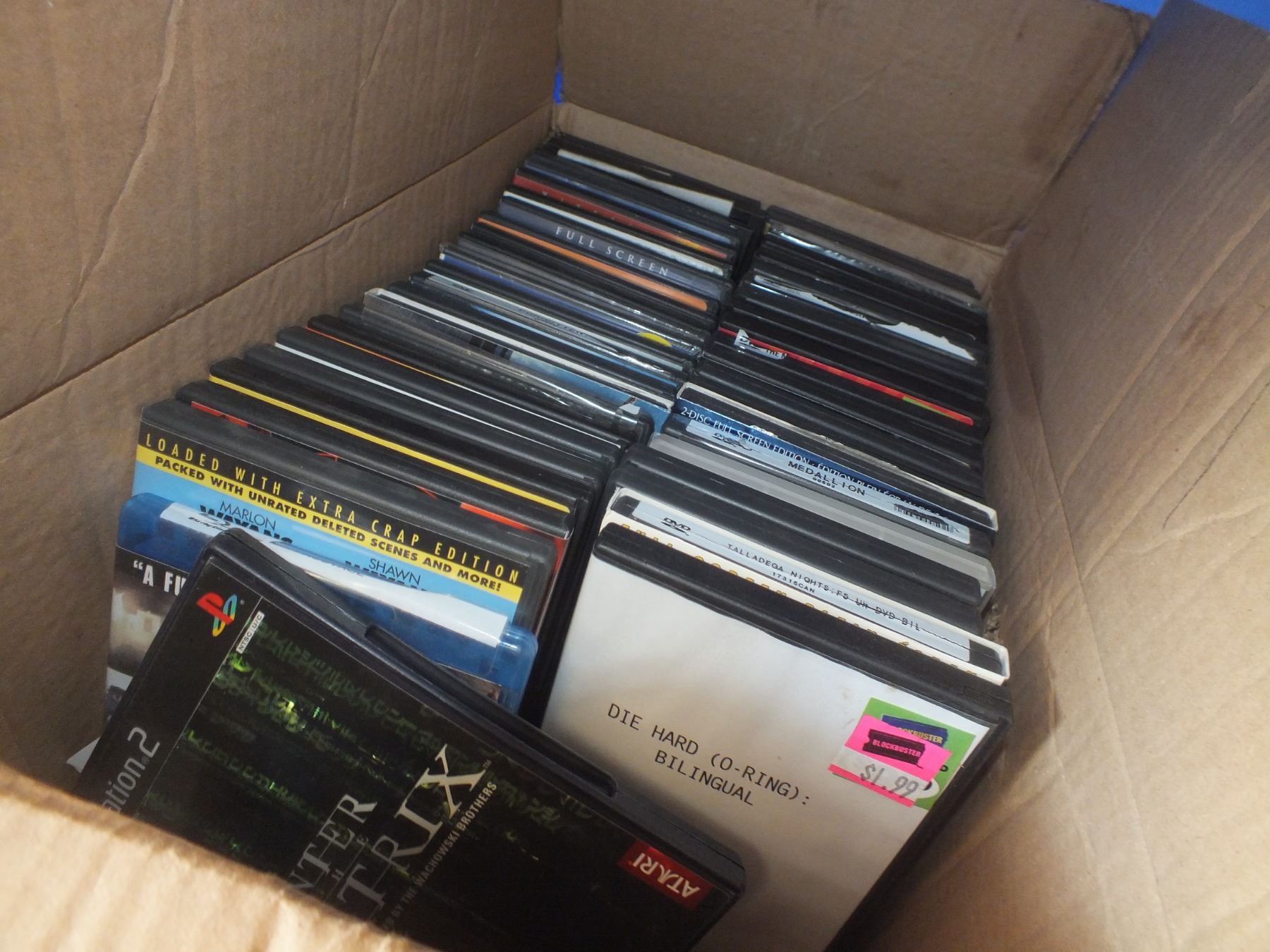 2 Boxes Of Assorted DVDS