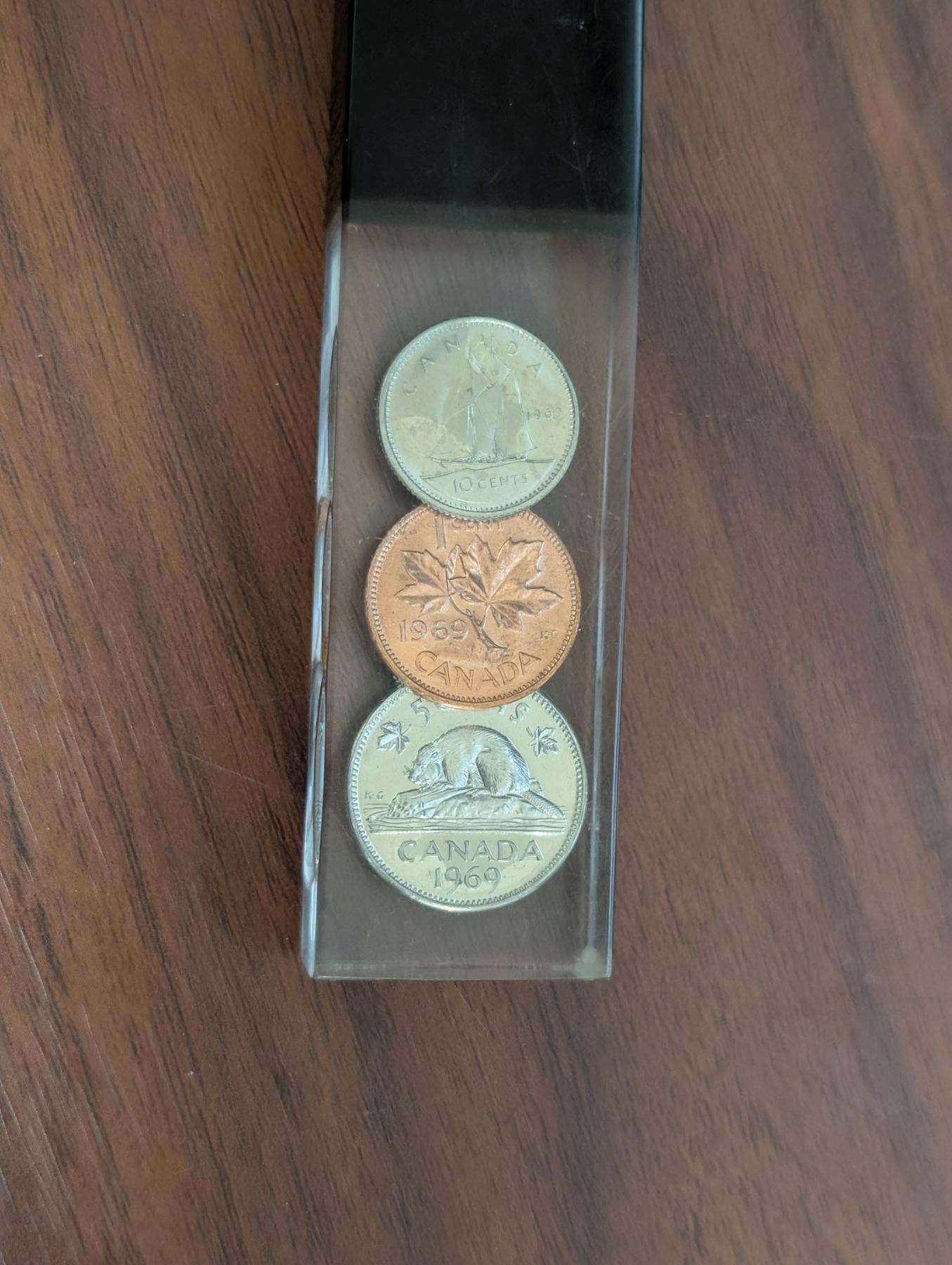 Letter Opener With Coins, Roll of Pennies, and etc. Lot - Schmalz Auctions