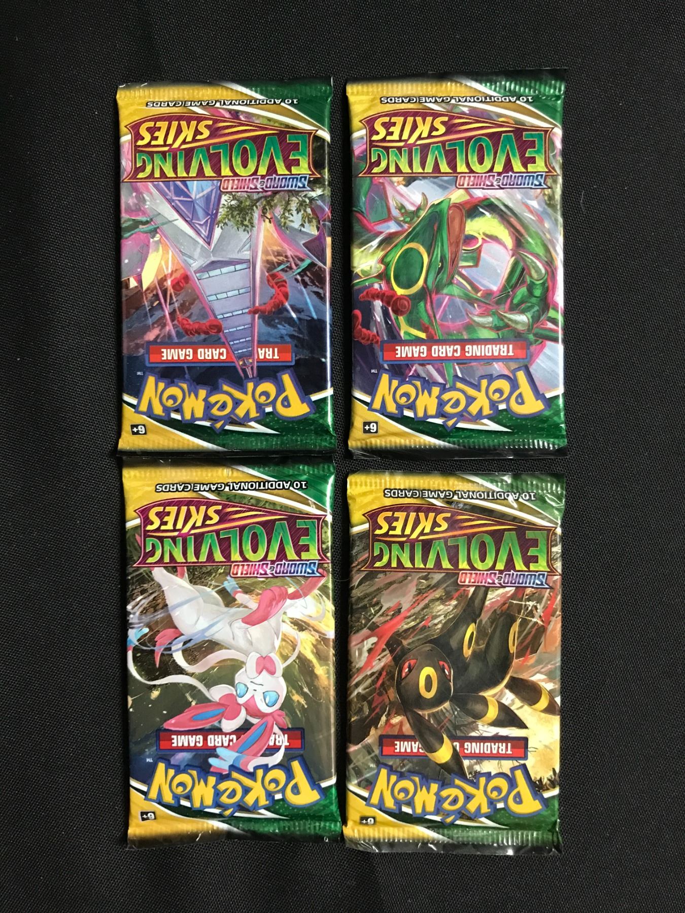 LOT OF 4 POKEMON TCG REVOLVING SKIES SEALED BOOSTER PACKS