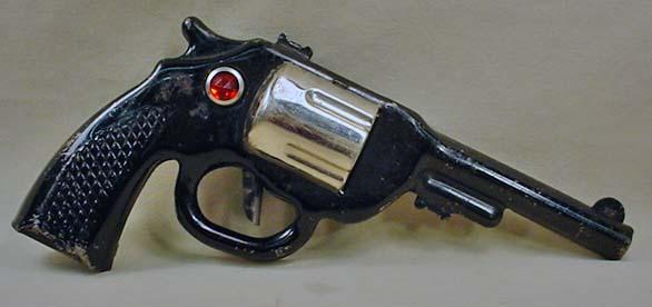 C. 1938 LONE RANGER TOY CLICKER GUN