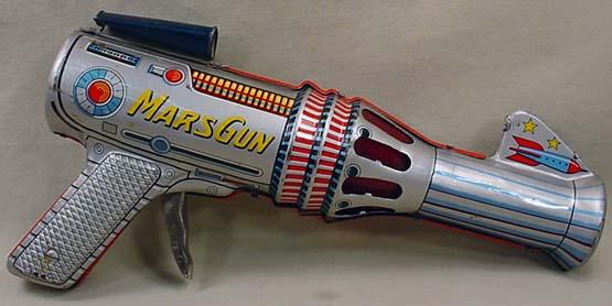 C. 1950'S DAIYA TIN LITHO MARS GUN TOY - Makes noi