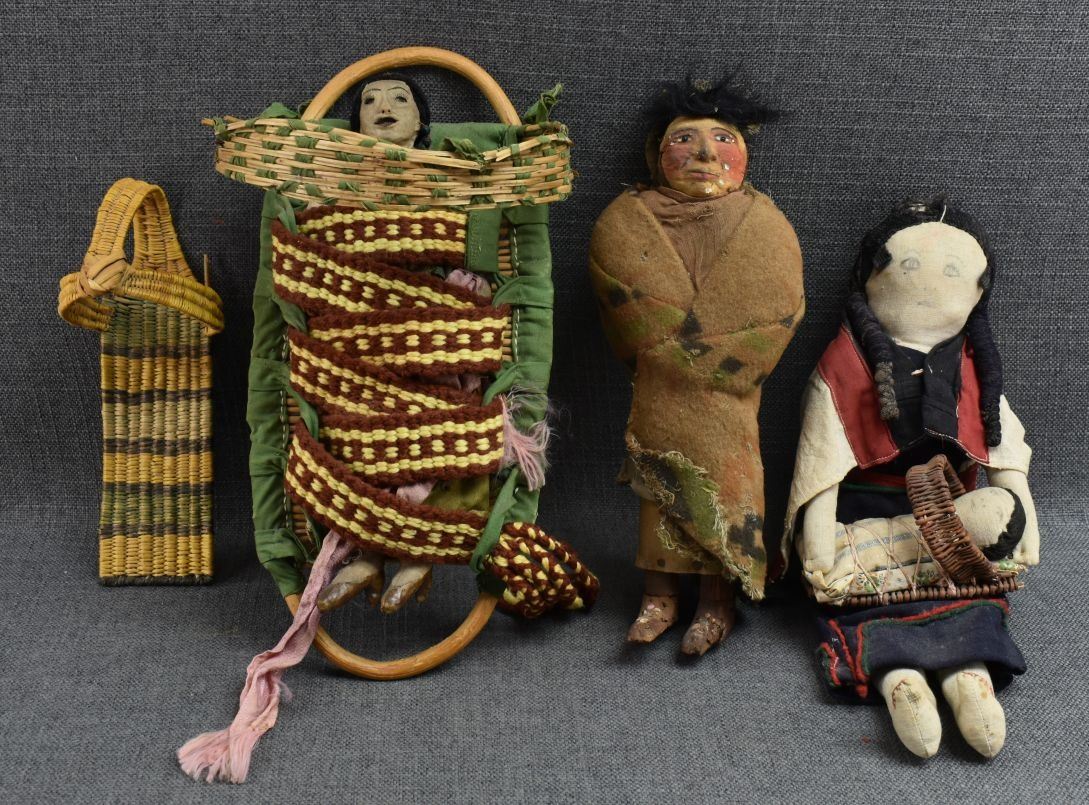 THREE TOY CRADLES, ONE SKOOKUM DOLL