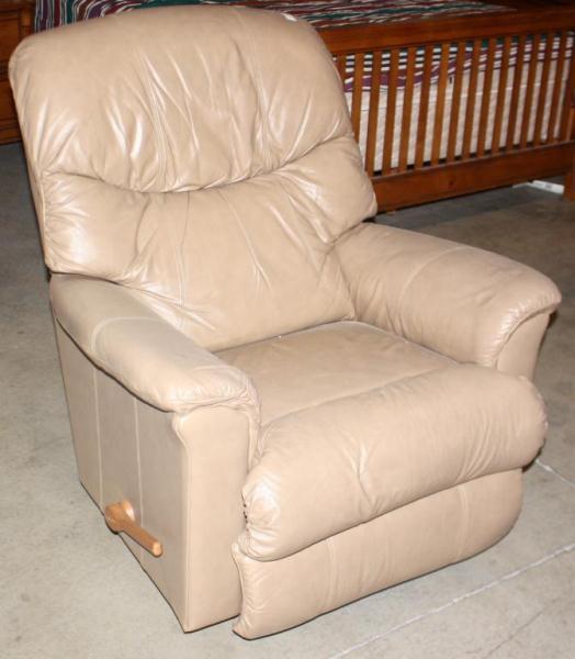 Tan Swivel Rocker Recliner Chair