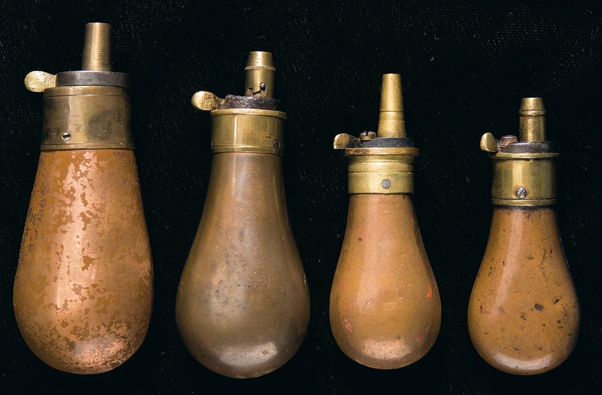 Four Small Powder Flasks