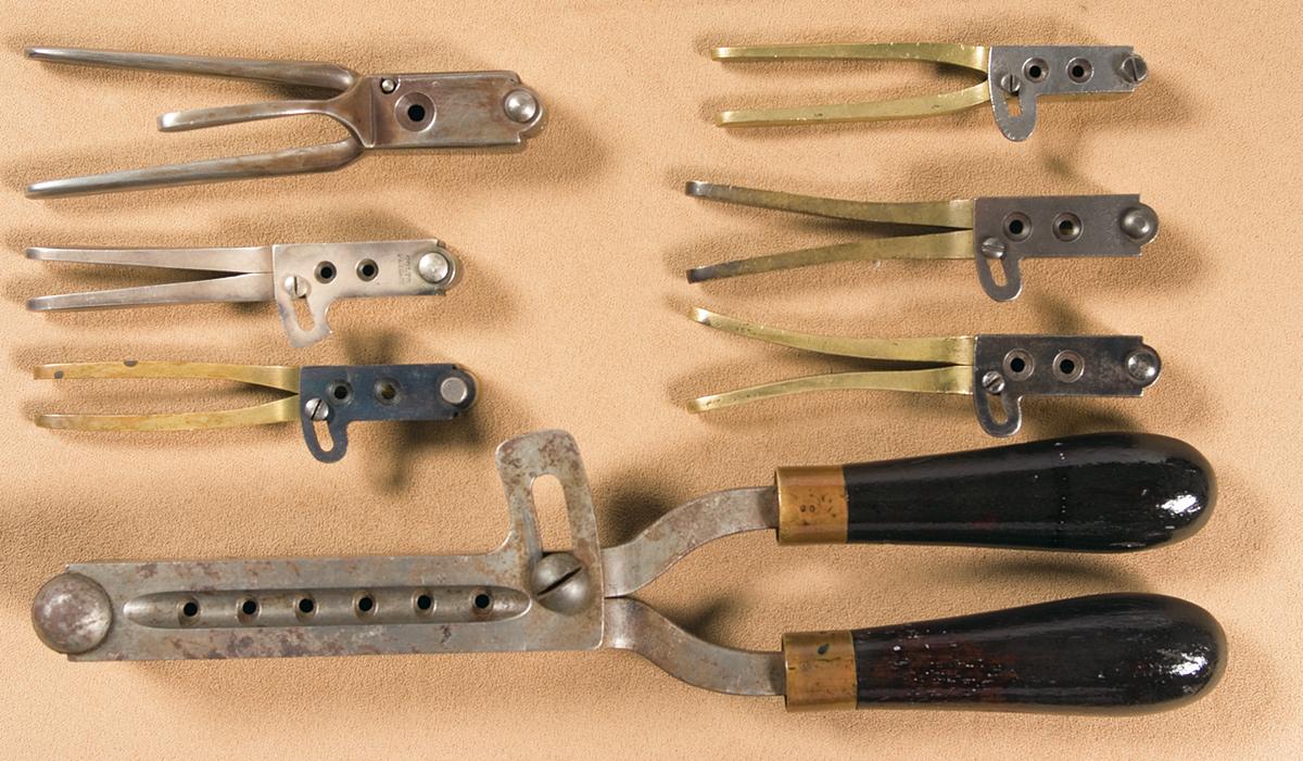 Seven Bullet Molds, Including a 6-Chamber Gang Mold
