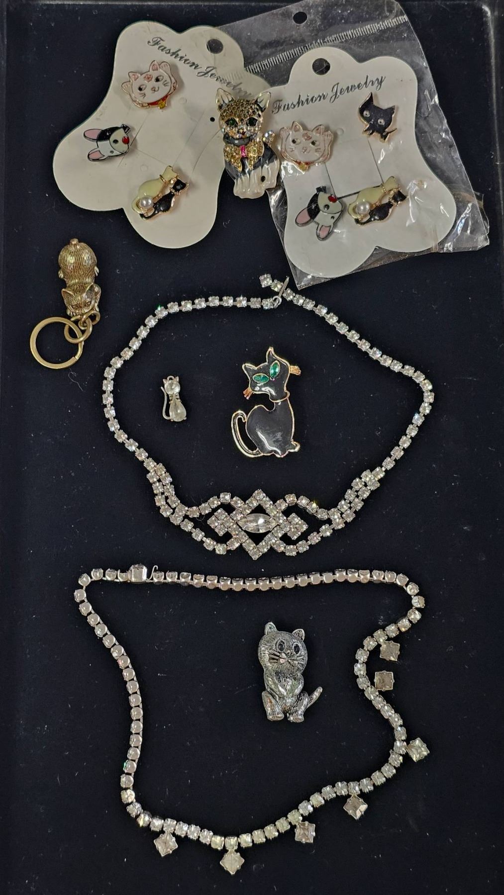 Cat-Themed Jewelry with Rhinestones and Metal Accents - Beck Auctions Inc.