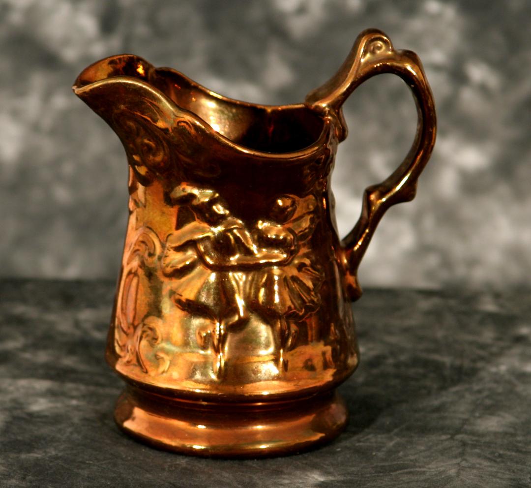 Antique Copper Lusterware Pitcher, relief molding