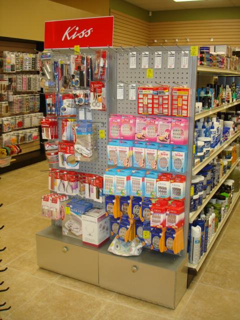 Metal Display Rack with bottom storage drawers