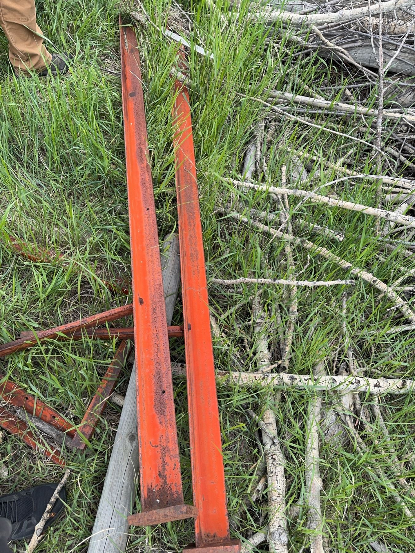 Steel feed stand I-beams with orange paint, each beam measuring ...