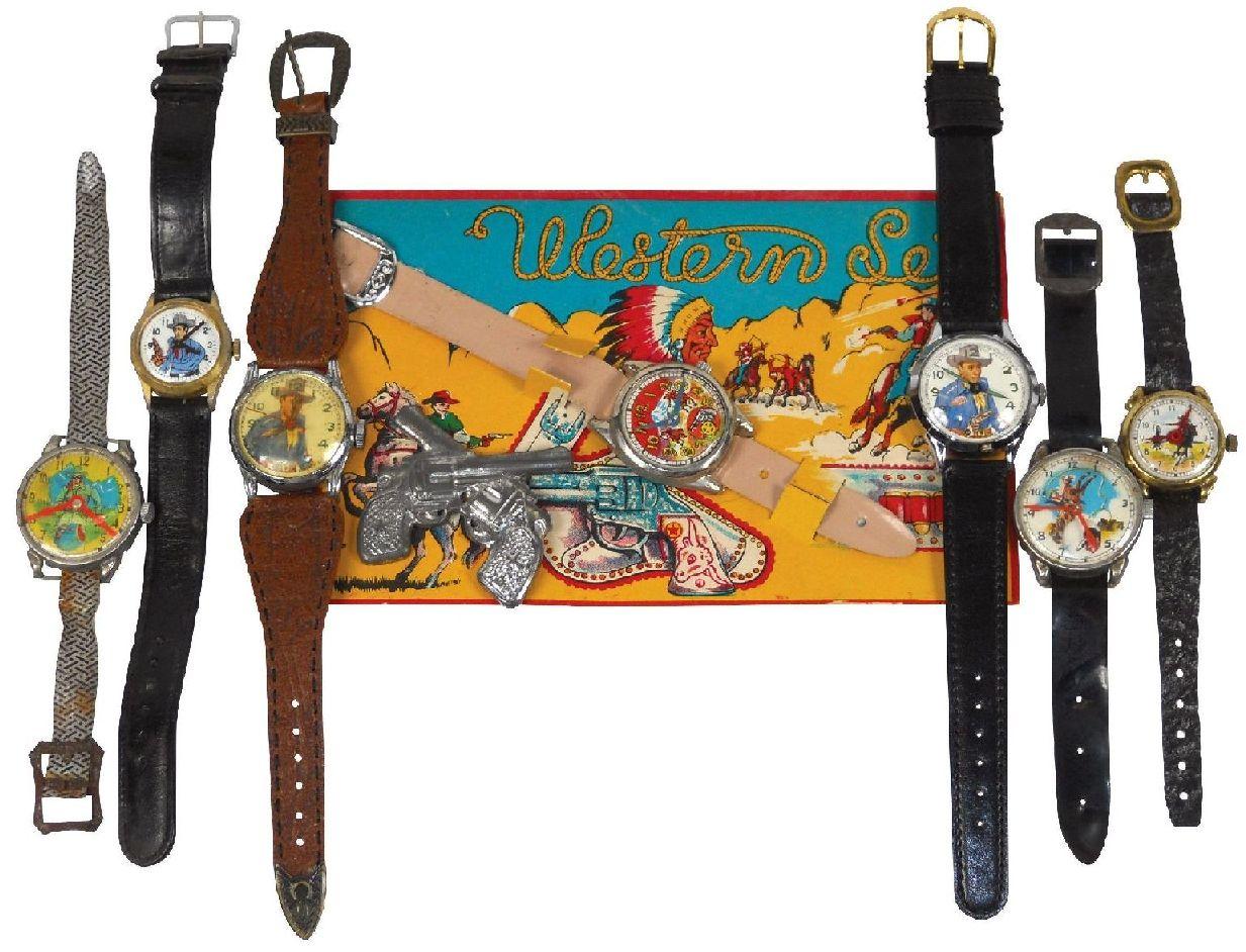 Cowboy character watches (7), Western Indian play watch & gun badge on ...