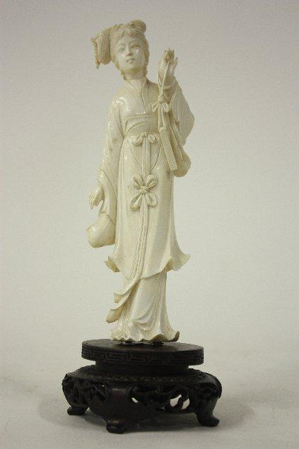 Ivory "Geisha Girl" on wood stand