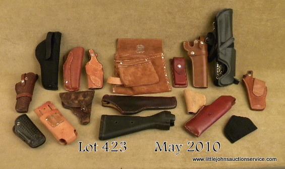 Bonanza lot of leather and miscellaneous gun related items. Hoppe's gun ...